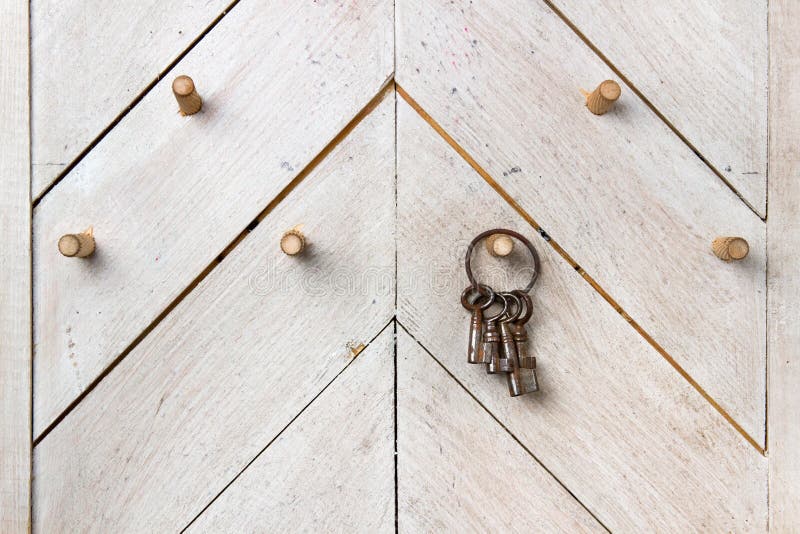 Set of keys on wooden wall stock image. Image of retro - 20258601