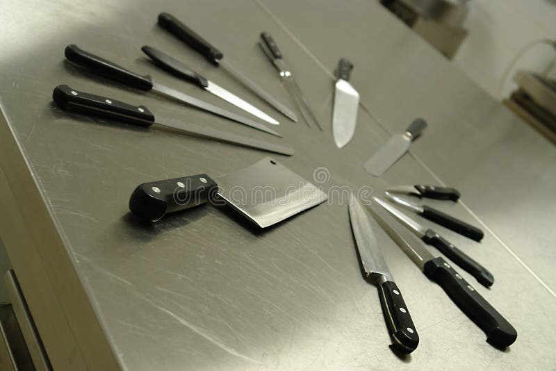 Set of Kitchen Knives Hanging on the Wall Stock Image - Image of silver ...