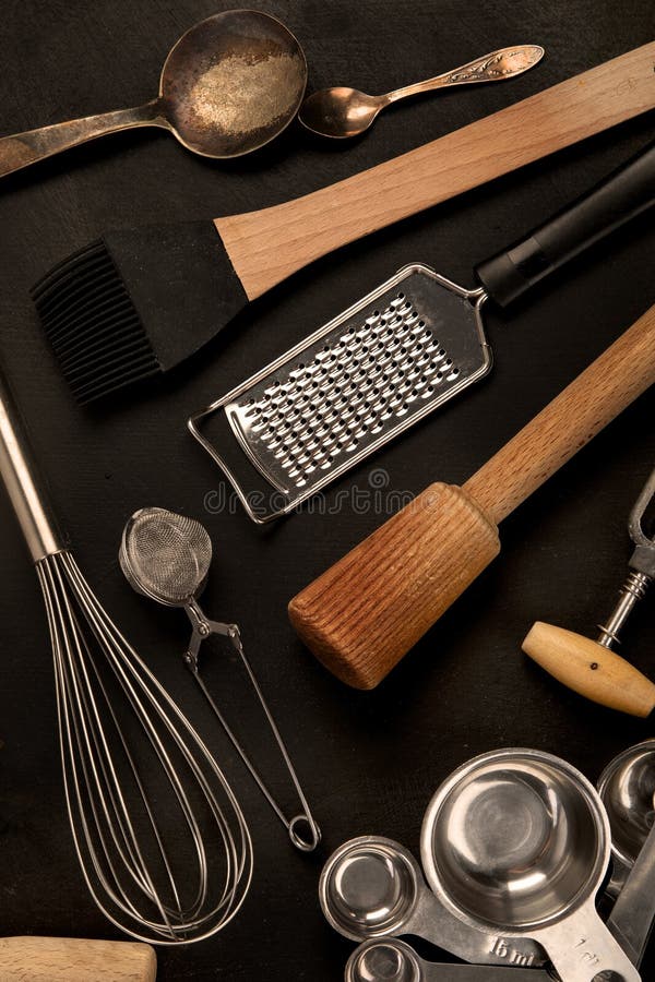 Set of Kitchen Utensils on Black Background. Tools for Cooking Stock ...