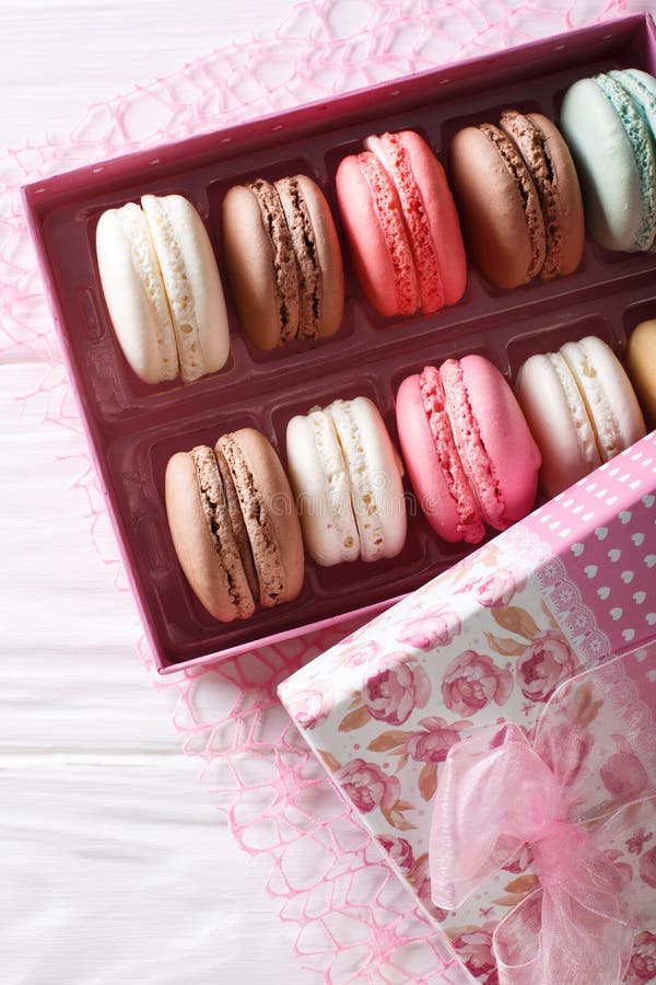 Set of Macaroons in a Pink Gift Box Close-up on a Table. Vertical Top ...