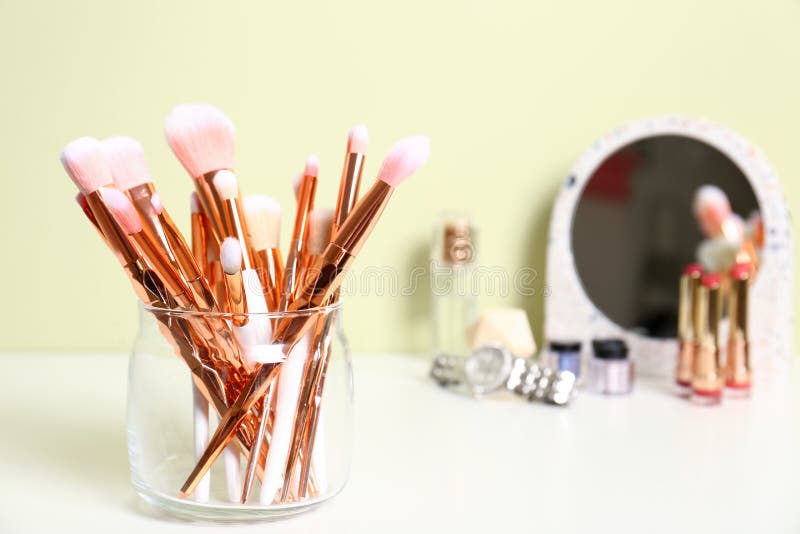 Set of Makeup Products and Brushes on Table Stock Photo - Image of girl ...
