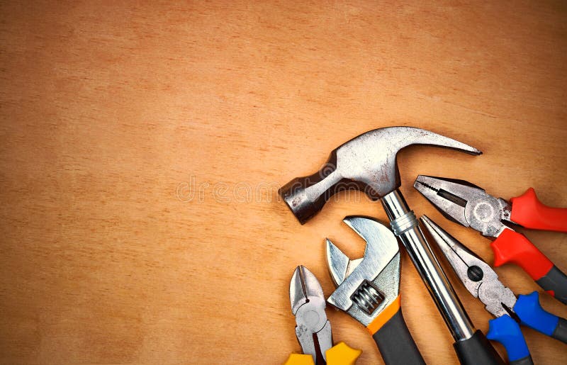 Set of Manual Tools Over a Wood Panel Stock Image - Image of space ...
