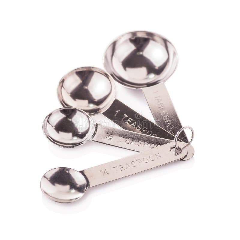 Set of Measuring Spoons Isolated on Table Stock Image - Image of ...