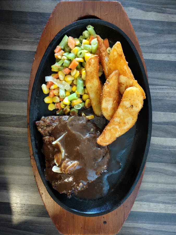 A Set Menu of Tenderloin Steak Complete with Vegetables Stock Photo ...
