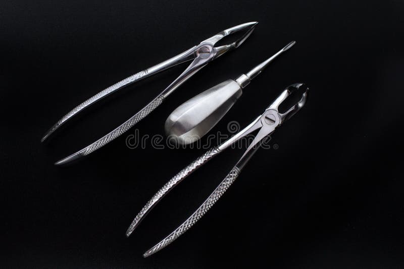 Set of Metal Dental Tools for Tooth Extraction Stock Photo - Image of ...