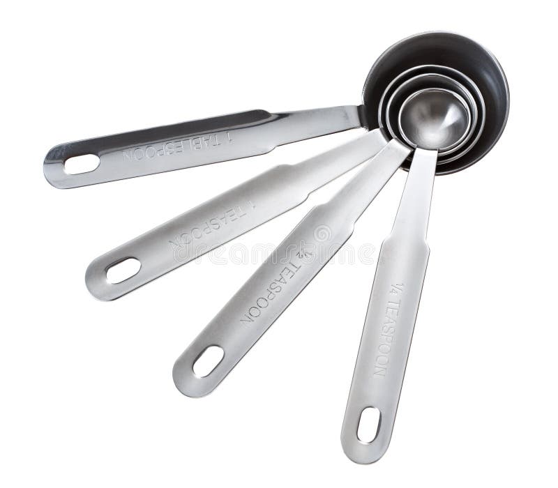 Set of Metal Measuring Spoons of Different Sizes. Isolated on White ...