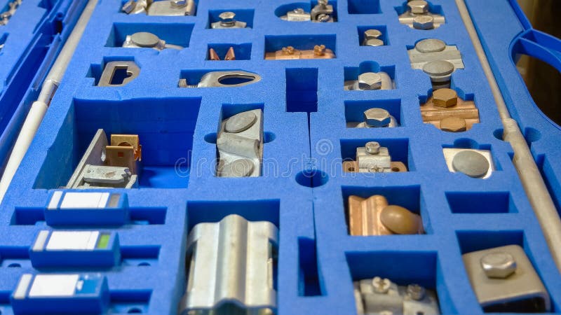 Set of Metallic Machine Details in the Blue Foam Rubber. Stock Image ...