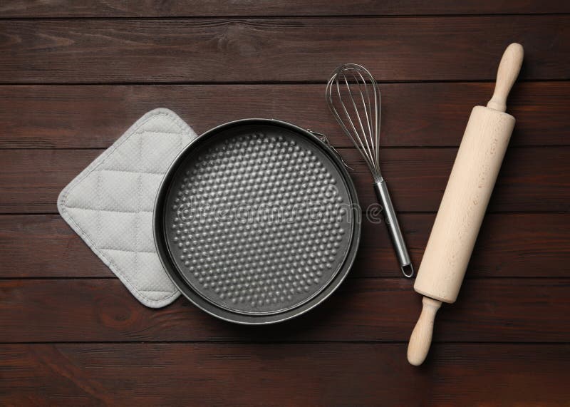 Set of Modern Cooking Utensils on Brown Wooden Table, Flat Lay Stock ...