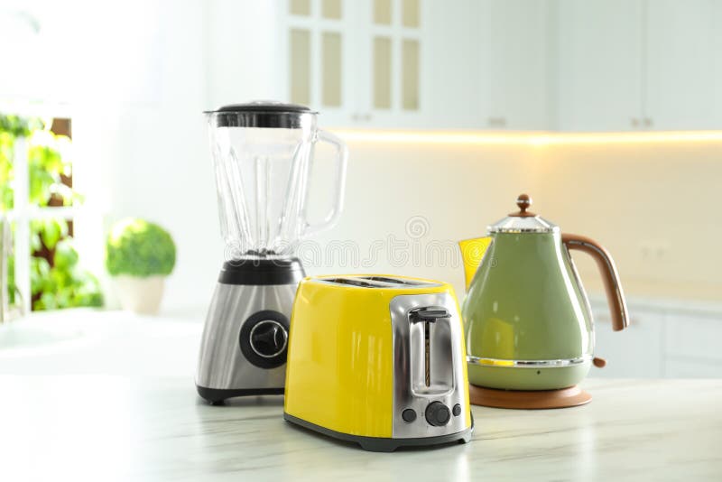 Set of Modern Home Appliances on Marble Table in Kitchen Stock Image ...