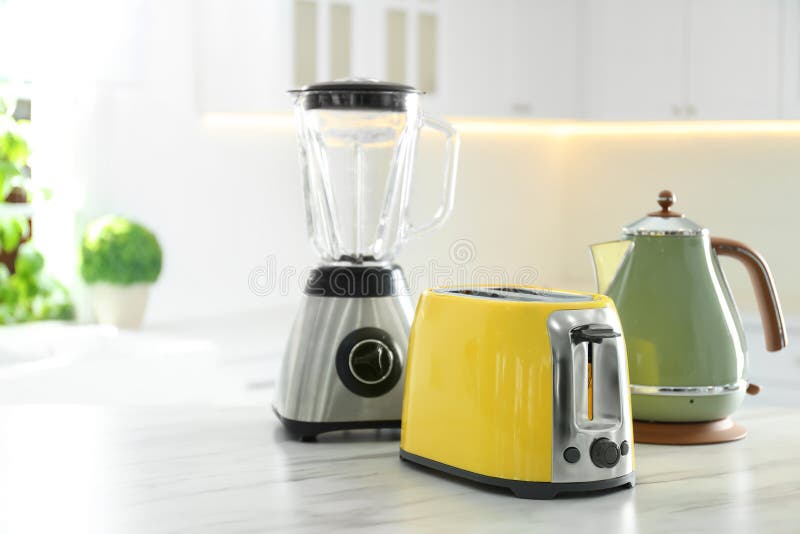 Set of Modern Home Appliances on Marble Table in Kitchen Stock Image ...