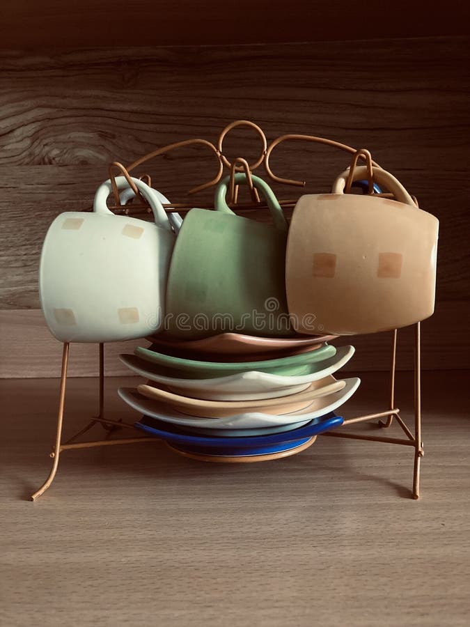 A Set of Multi-colored Cups and Saucers, Assembled Stock Image - Image ...