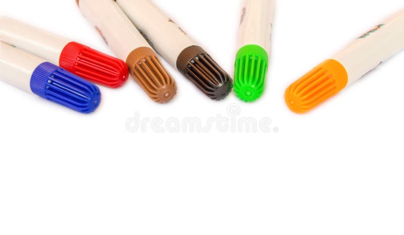 A Set of Multi-colored Markers on the Upper Edge on a White Background ...