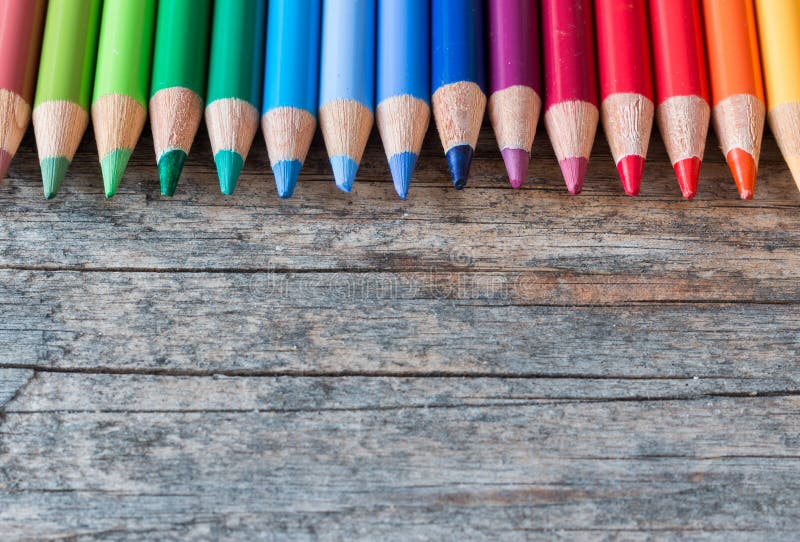 Creativity: Multi-colored Pencils on Rustic Wooden Table Stock Photo ...