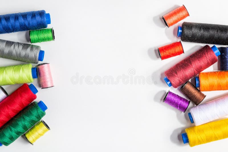 Set of Multi-colored Threads for Sewing on a White Background Stock ...