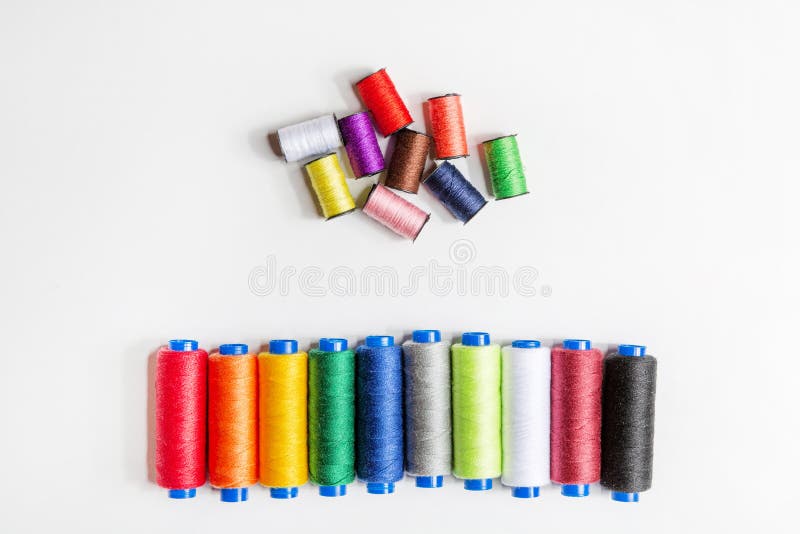 Set of Multi-colored Threads for Sewing on a White Background Stock ...