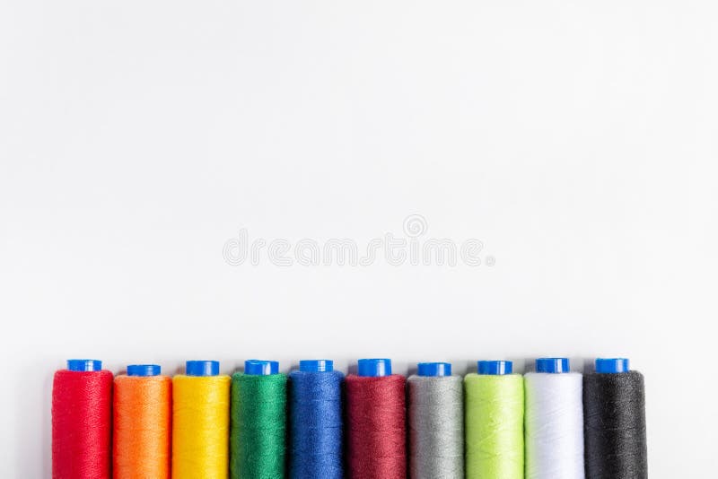 Set of Multi-colored Threads for Sewing on a White Background Stock ...