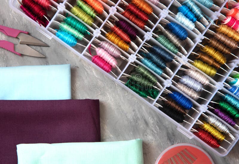 Set of Multicolored Cotton Threads and Fragments of Different Fabrics ...