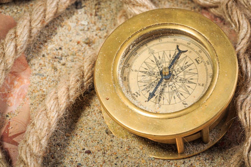 Set of Nautical Instruments, Lying on the Sand and Stock Photo - Image ...