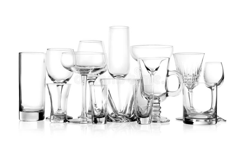 Set of Bar Glassware on White Table Against Black Background Stock ...