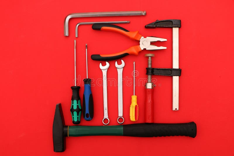 A Set of New Hand Tools on a Red Background Stock Image - Image of ...