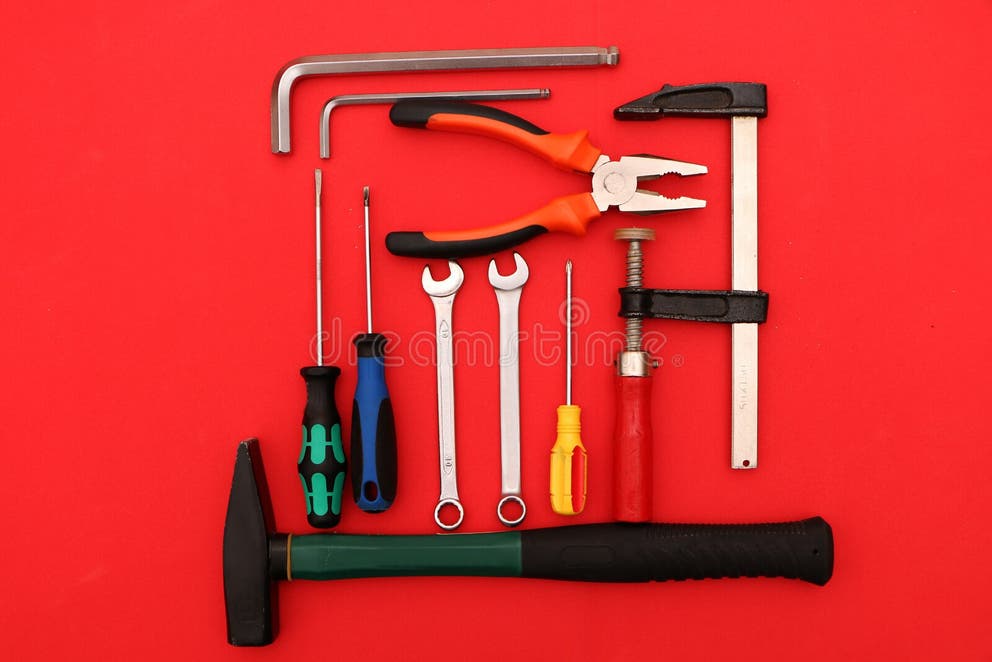 A Set of New Hand Tools on a Red Background Stock Image - Image of ...