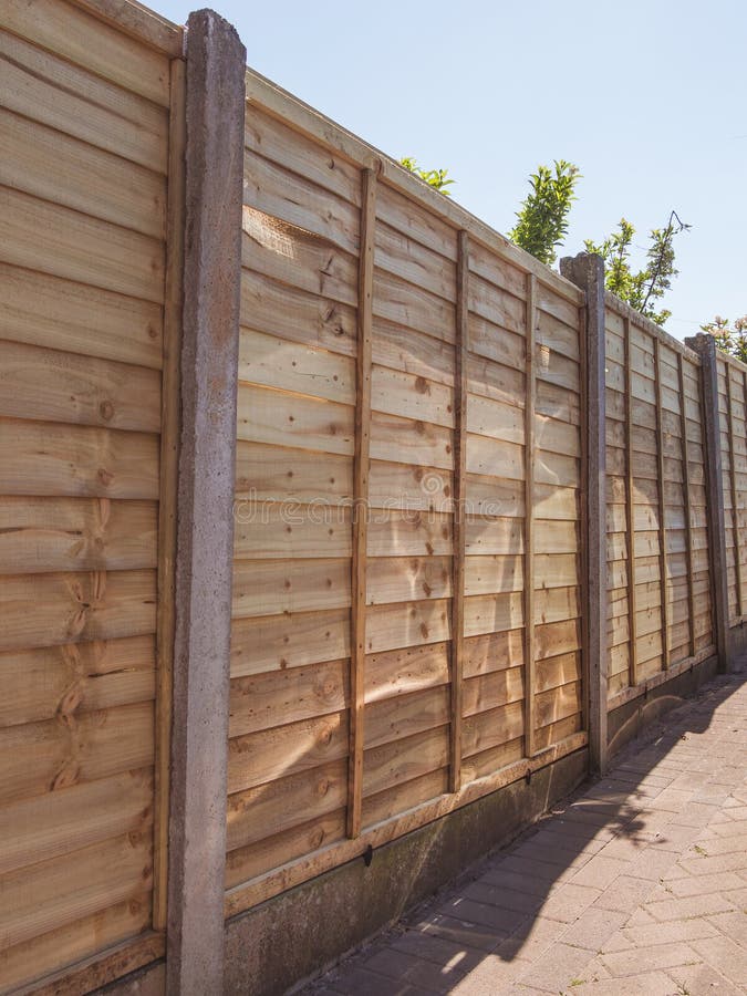 A Set of Newly Installed Set of Treated Overlap Fence Panels Stock ...
