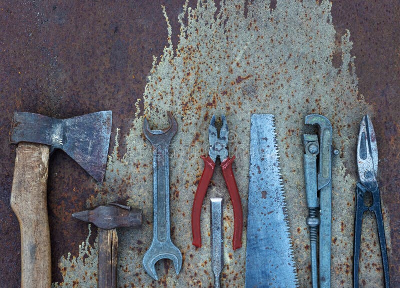 Set of Old Construction Tools: Hammer, Saw, Pliers, Etc. on a Flat Lay ...