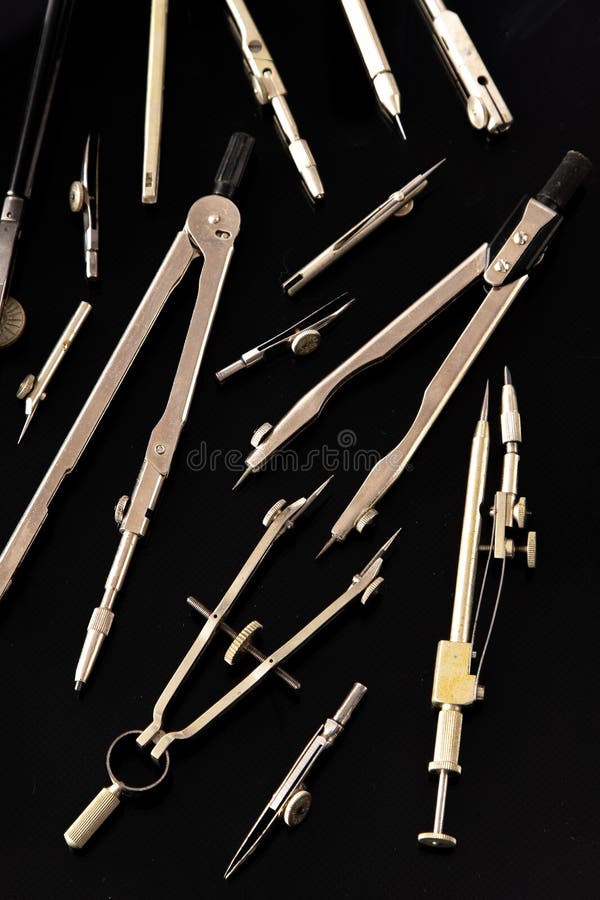 Set of Old Different Compasses. Retro Metal Compasses and Drafting ...