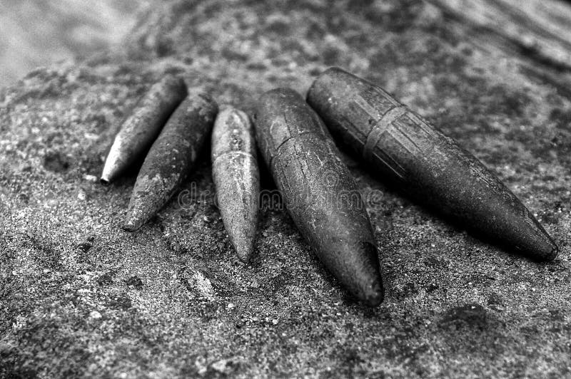 Set of Old Gray Bullets on a Stone Surface Stock Image - Image of ...