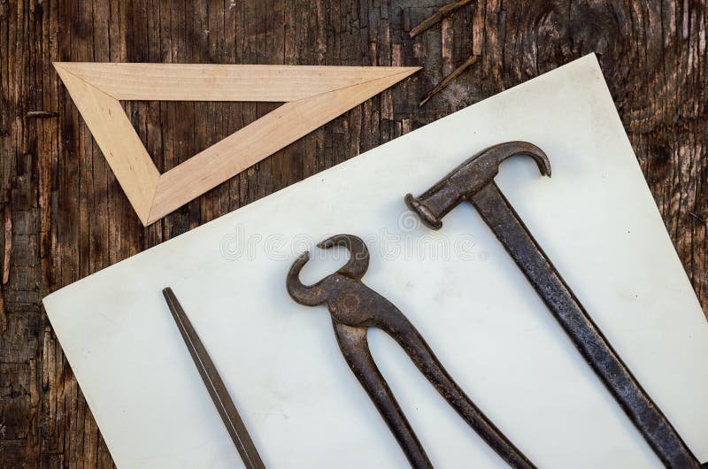 A Set of Old Hand Tools and a Ruler. File, Pliers, and a Hammer Stock ...