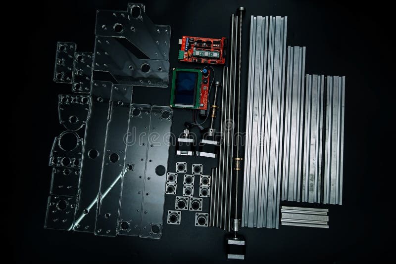 A Set of Different Parts for a Laser Machine on a Black Background ...