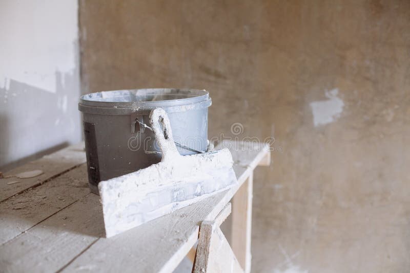 Set of Plaster Trowel Tool, Spatula and Bucket. Stock Photo - Image of ...
