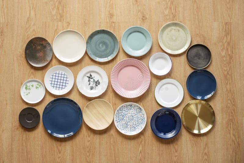 Set of Plates of Different Materials, Styles and Colors on Stock Photo ...