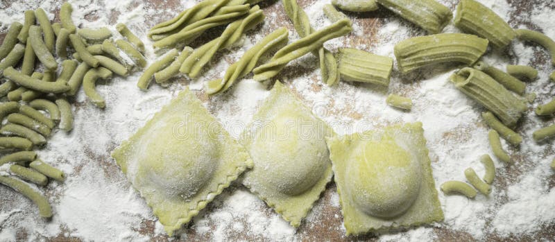 Set of Ravioli and Short Fresh Spinach Pasta on a Table Stock Image ...