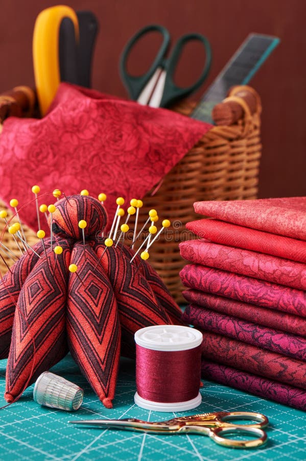 Set of Red Fabric and Sewing Tools on Craft Mat Stock Photo - Image of ...