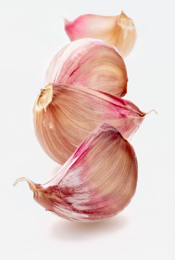 Set of Red Garlic Cloves. Isolated. Stock Photo - Image of ...