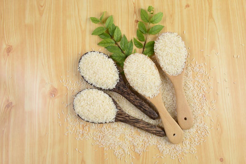 Set of Rice Collection on Ladle on Wood Texture Background Stock Image ...