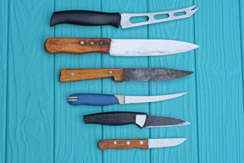A Set of a Row of Different Old Colored Table Knives Stock Image ...