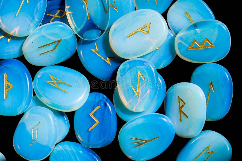 Set of Runes for Fortune Telling Laid Out on a Table. Stock Image ...