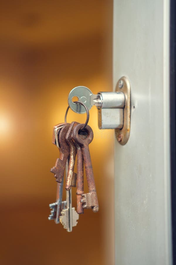 Set of Rusty Keys in the Keyhole Stock Photo - Image of house, iron ...