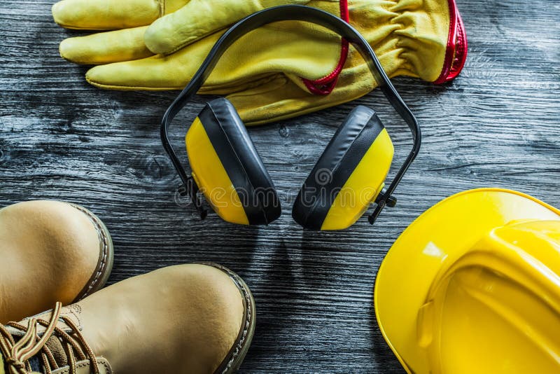 Set of Safety Workwear on Wooden Board Stock Photo - Image of safety ...