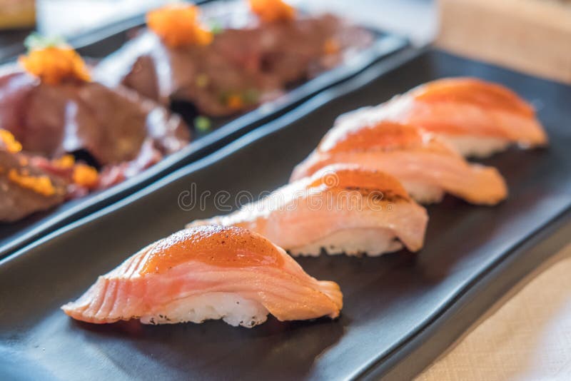 Set of Salmon aburi sushi stock image. Image of delicious - 222494697