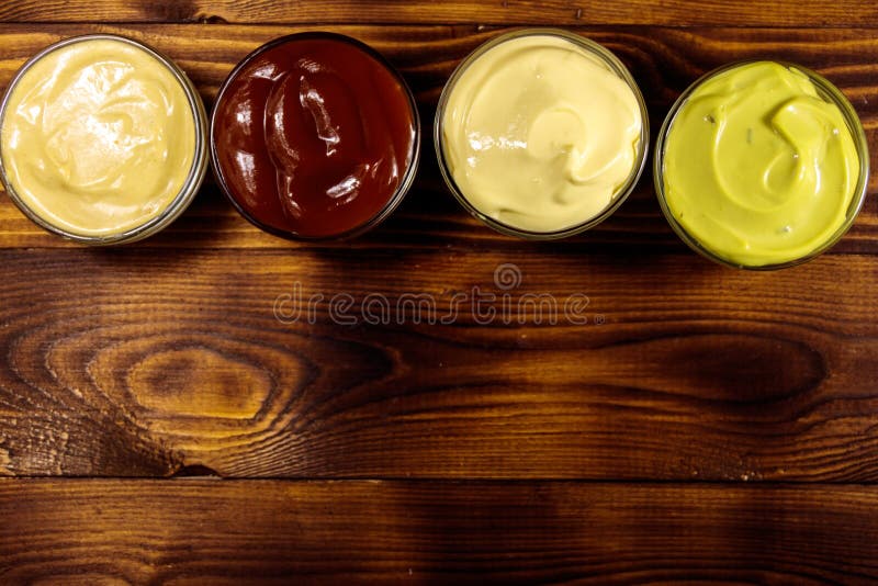 Set of Sauces on Wooden Table Stock Photo - Image of kitchen, cuisine ...