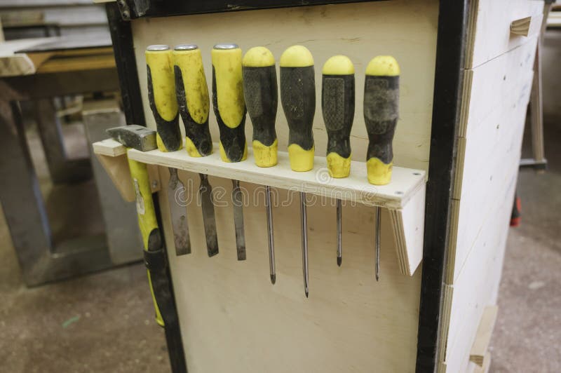 A Set of Screwdrivers Hanging in the Workshop Stock Photo - Image of ...
