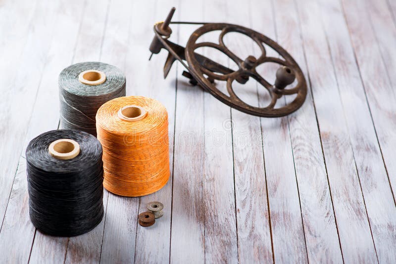 Set of Sewing Threads for Shoes on a Wooden Background Stock Photo ...