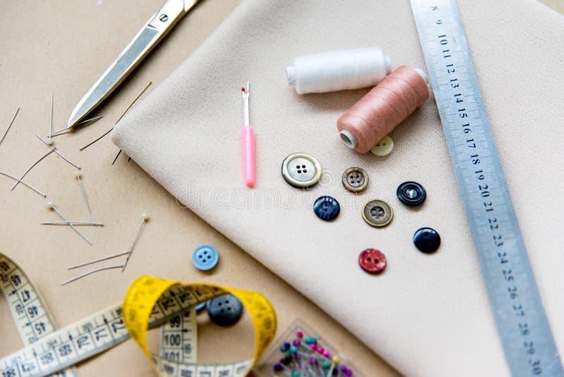 Set of Sewing Tools - Scissors, Needles, Buttons, Thread on a Table ...