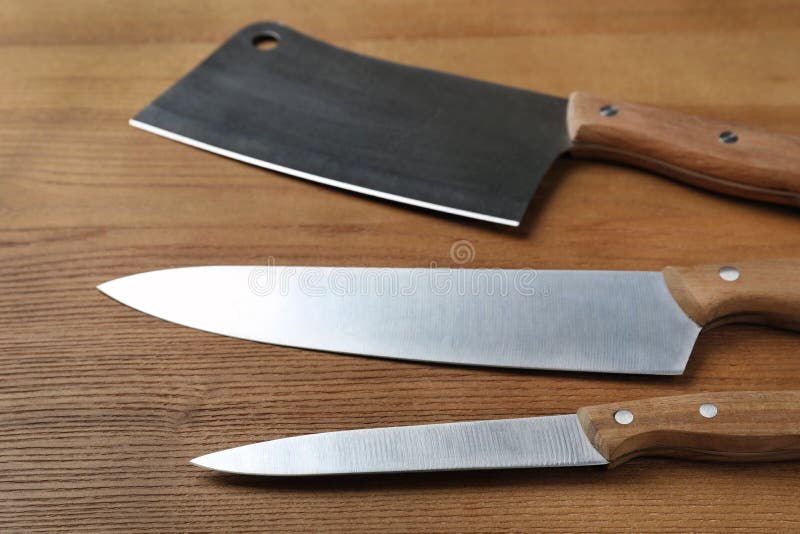 Set of Sharp Kitchen Knives on Table Stock Photo - Image of metal ...