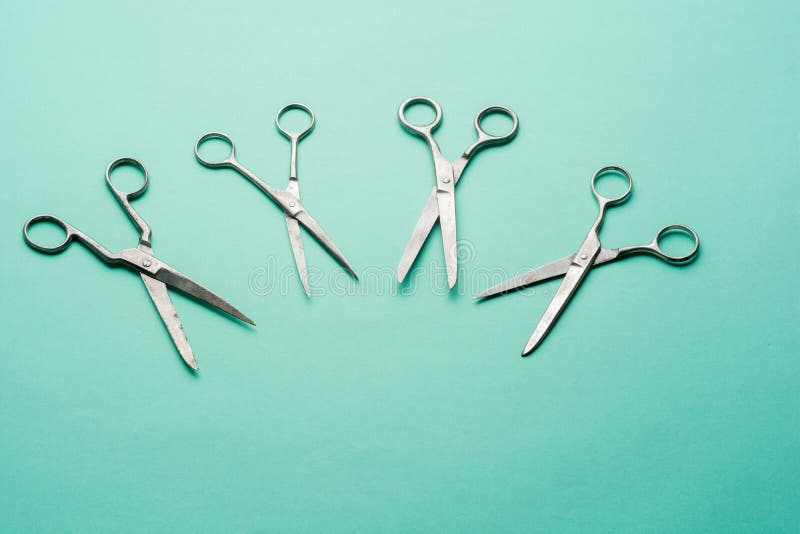 Set of Sharp Steel Scissors on the Turquoise Surface. Open Scissors on ...