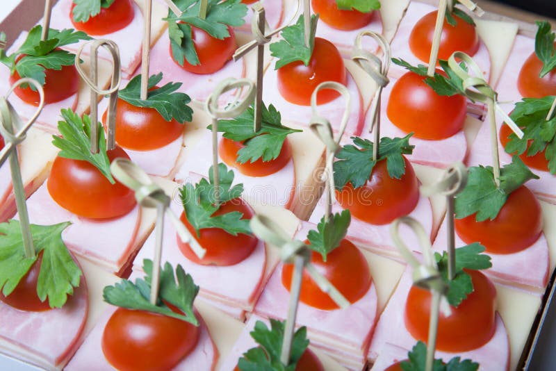 Set of Small Snacks Canape with Cherry Tomatoes, Cheese and Ham Stock ...