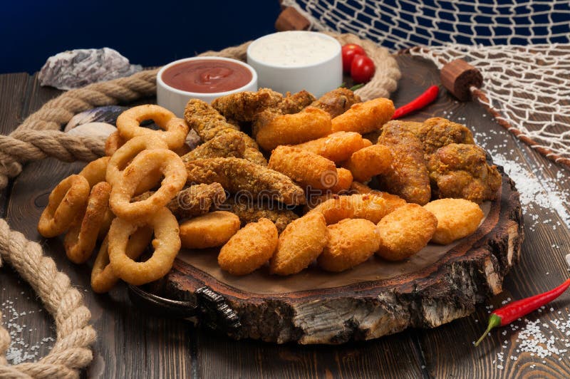 A Set of Snacks Fries for Beer on a Tree Cut Stock Image - Image of ...